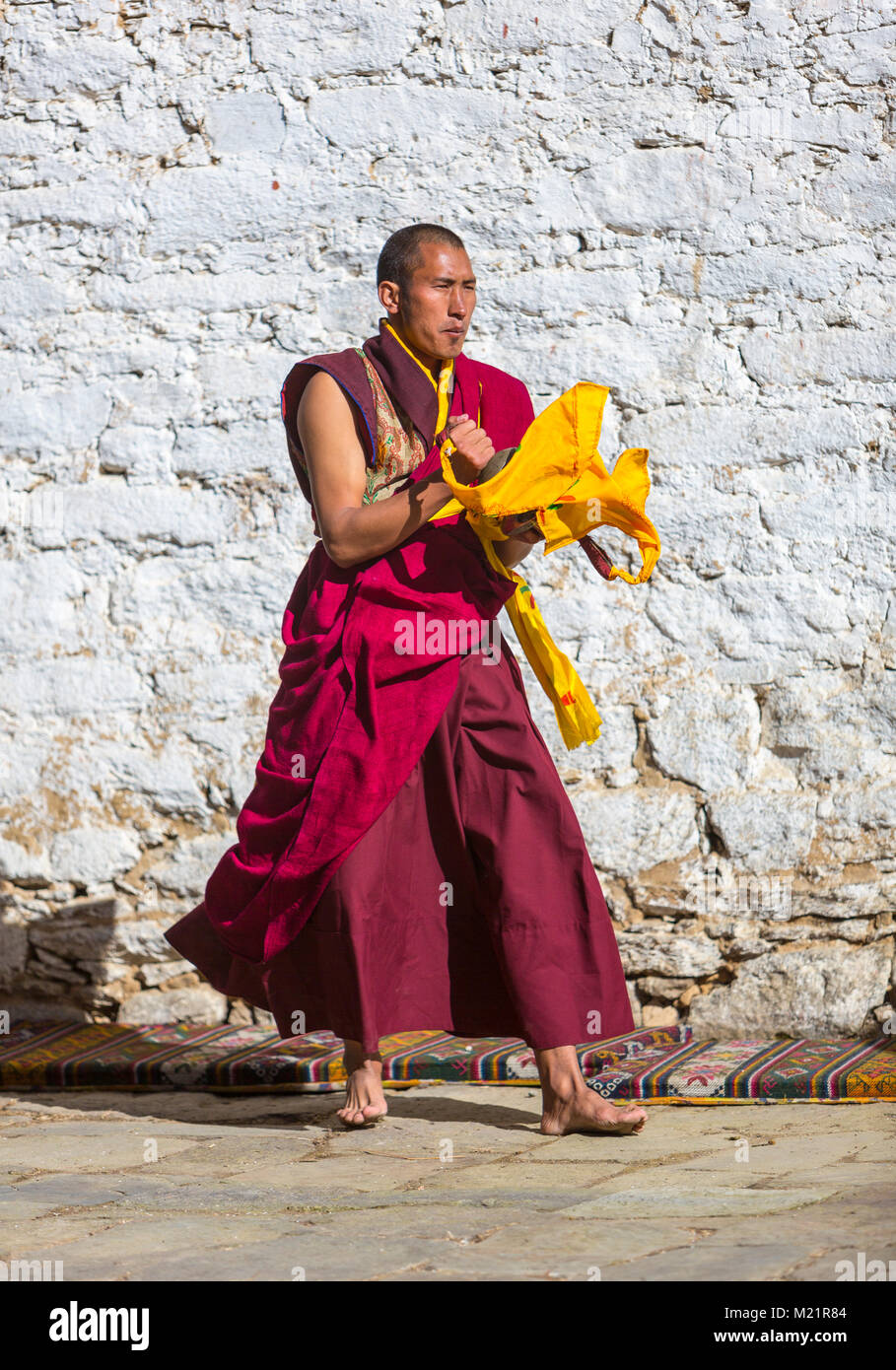 Prakhar Lhakhang, Bumthang, Bhutan. Monk with Cymbals Dancing in a ...
