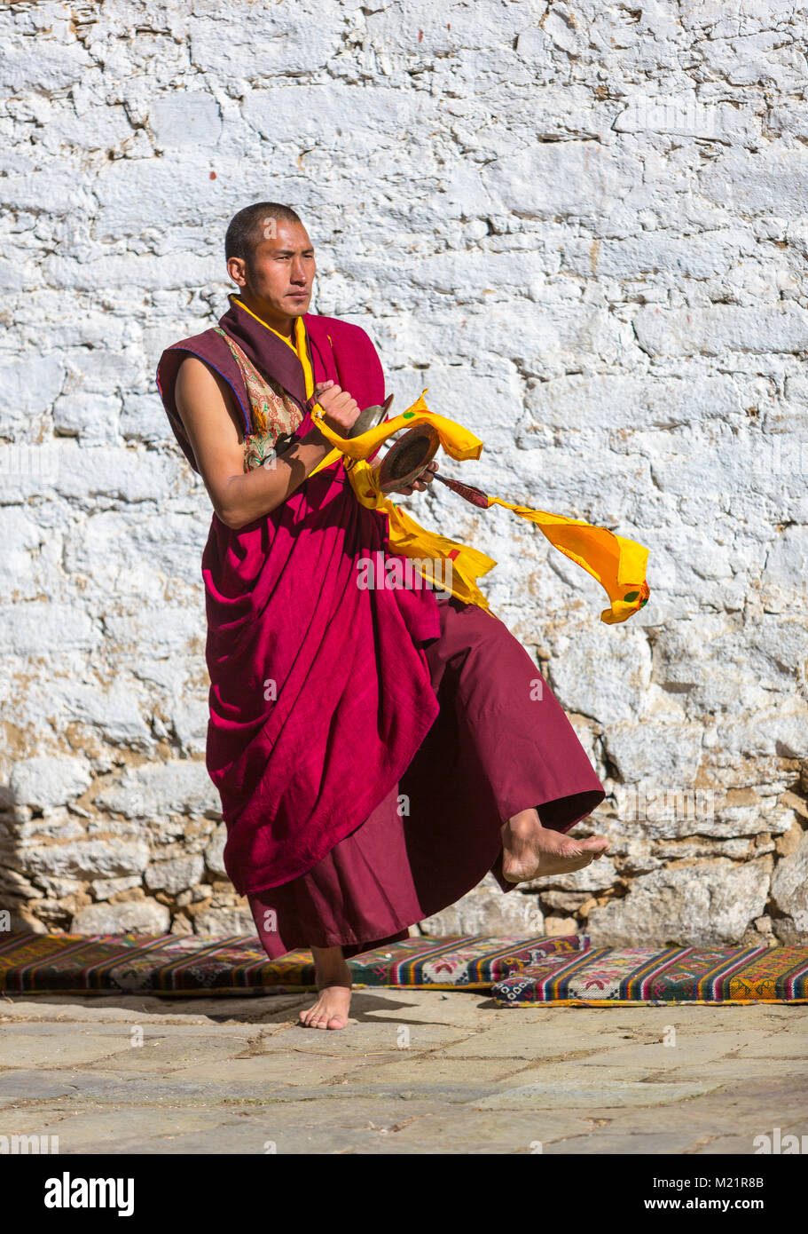 Prakhar Lhakhang, Bumthang, Bhutan. Monk with Cymbals Dancing in a ...