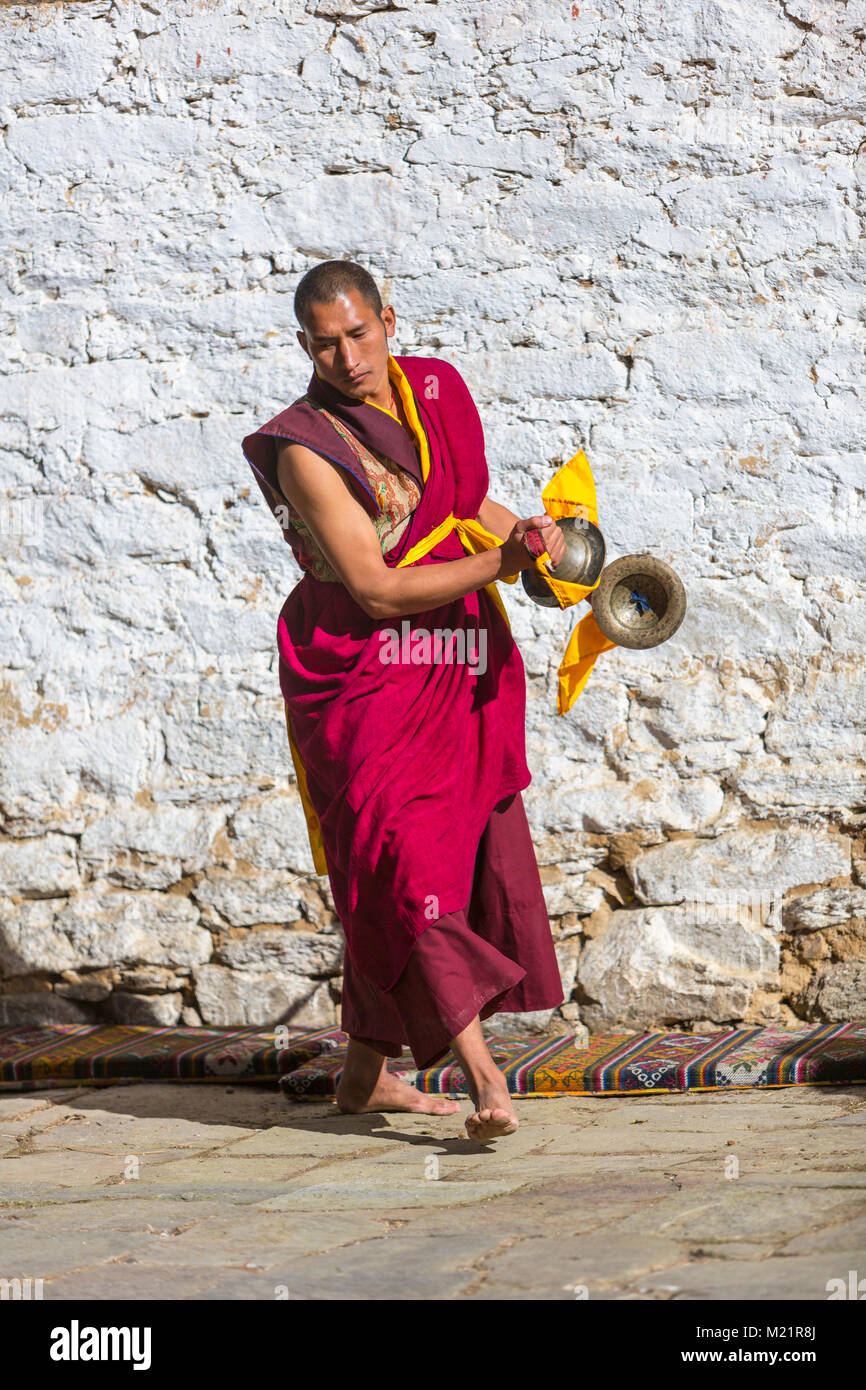 Prakhar Lhakhang, Bumthang, Bhutan. Monk with Cymbals Dancing in a ...