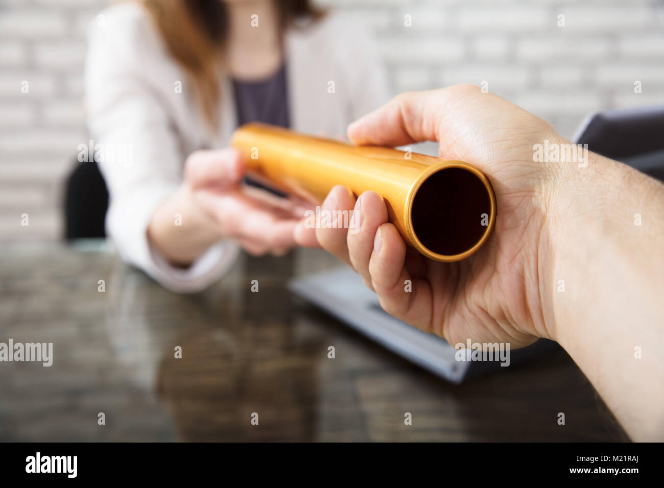 Passing the baton corporate hi-res stock photography and images - Alamy