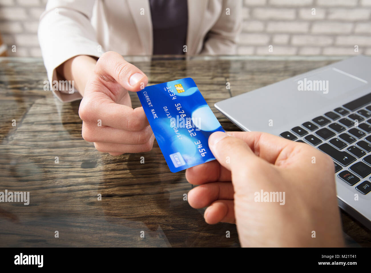 Person with business card hi-res stock photography and images - Alamy