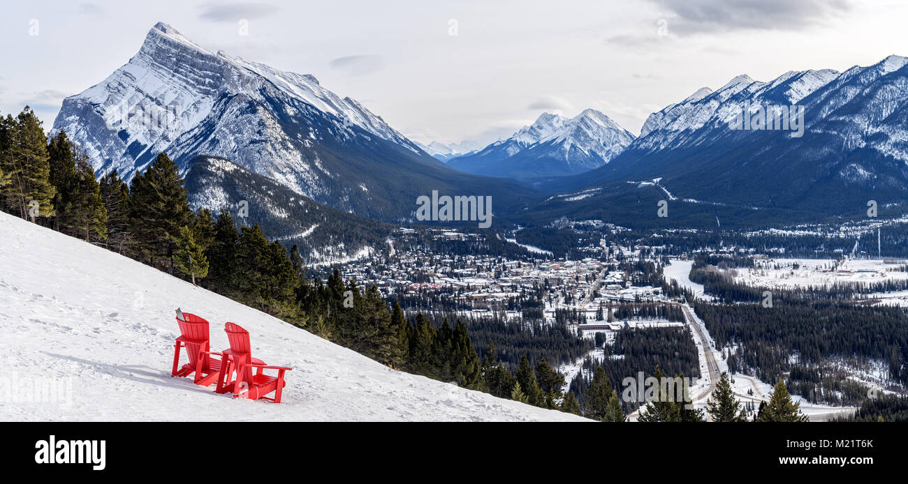 Aerial view of the city of Banff with that iconic red chairs in the ...