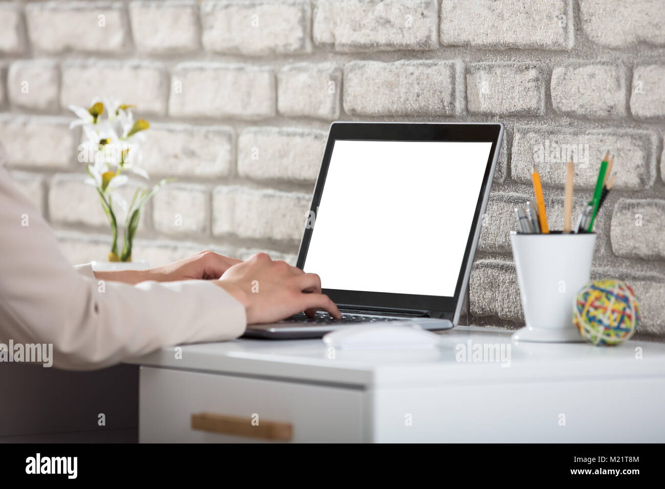 Close-up Of A Business Person's Hand On Laptop Keypad In Office Stock ...