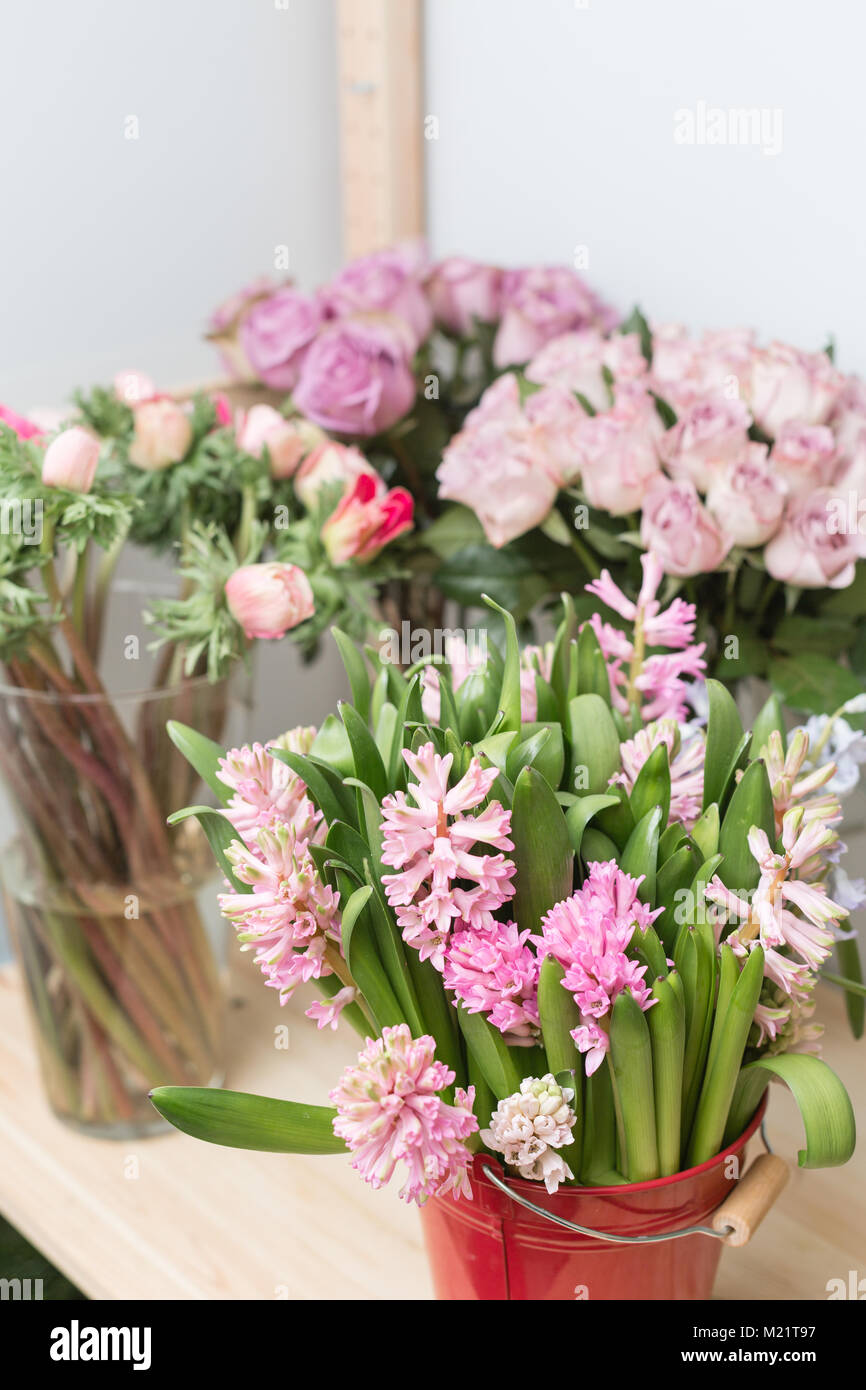 Flower shop concept. Different varieties fresh spring flowers in ...