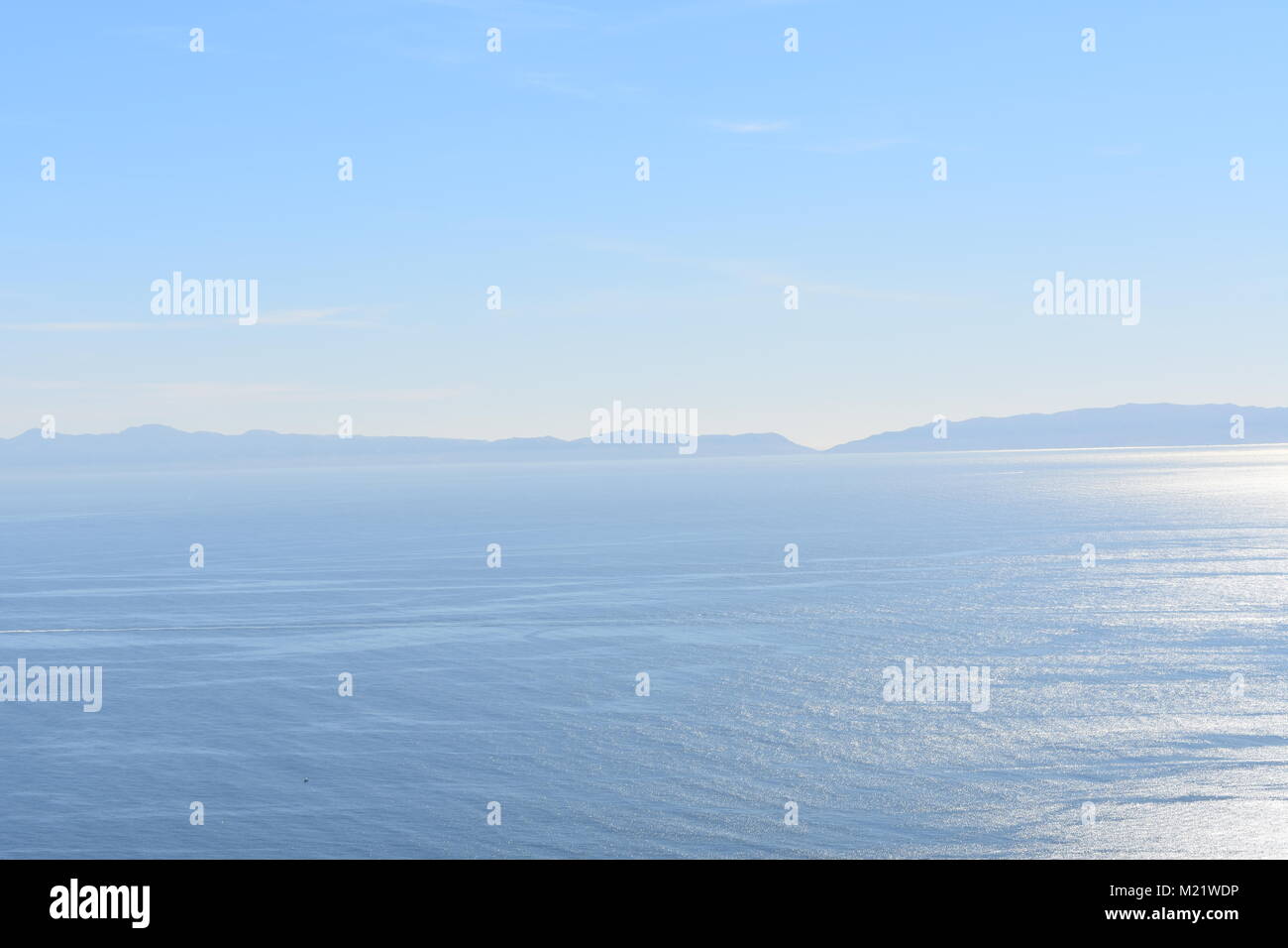 A peaceful beautiful blue ocean on a bright, sunny, blue sky day Stock ...