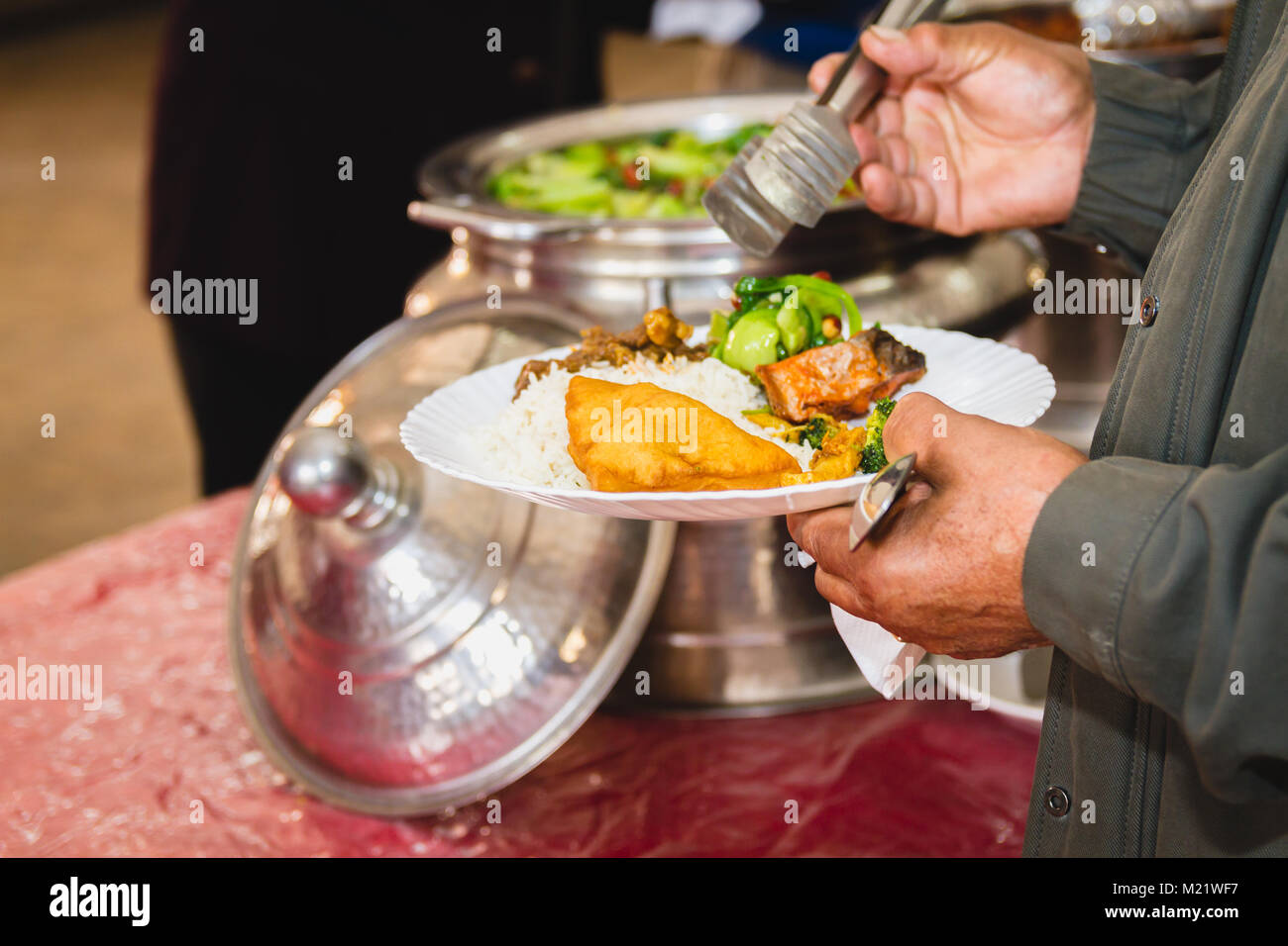 People taking food from buffet at the party Stock Photo - Alamy