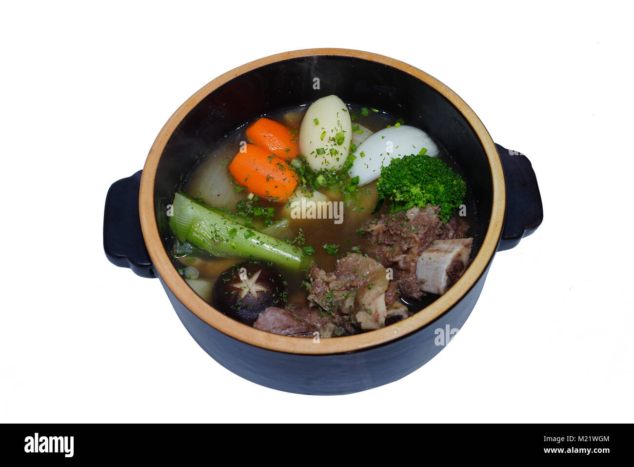 Pot au feu isolated on white background Stock Photo - Alamy