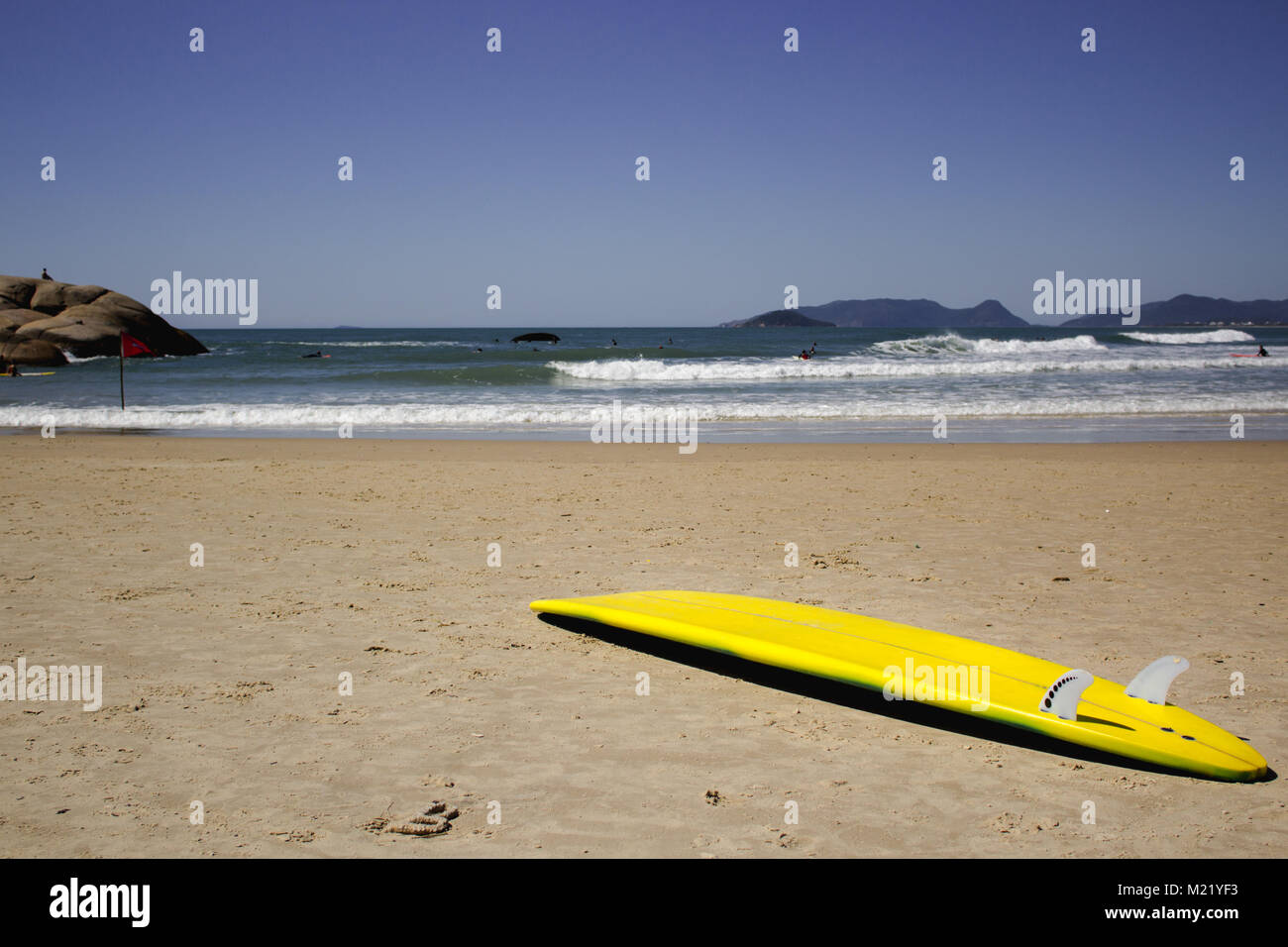 Yellow surfboard in a brazilian beach in a bright day Stock Photo - Alamy