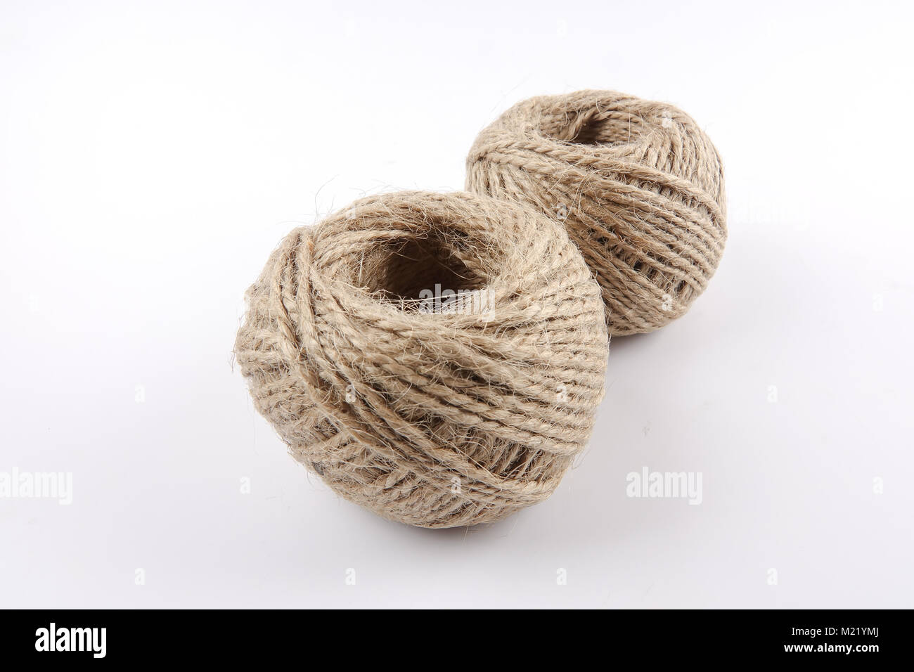 Various colour of ropes isolated on white background Stock Photo - Alamy