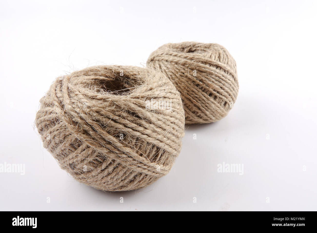 Various colour of ropes isolated on white background Stock Photo - Alamy