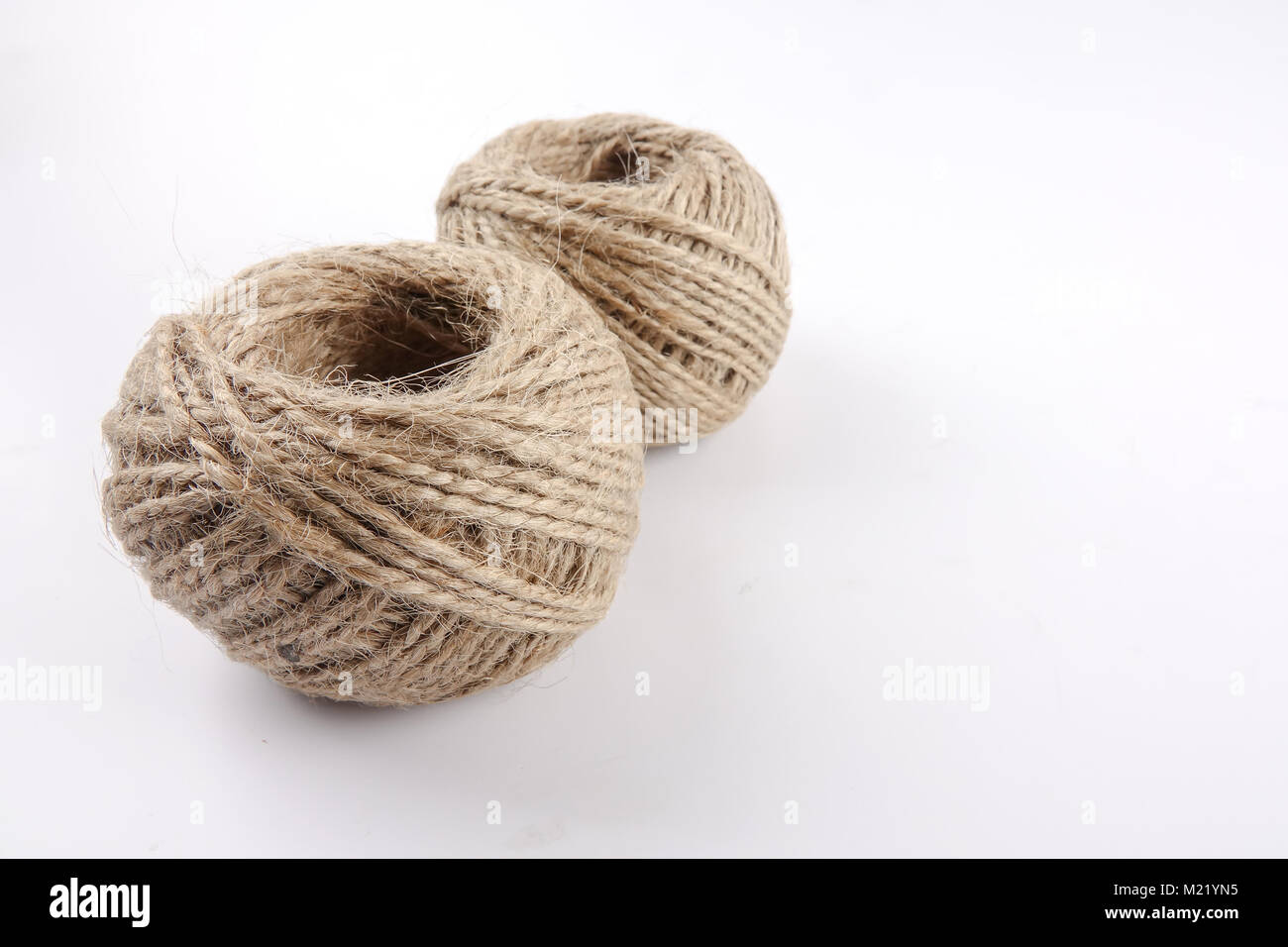 Various colour of ropes isolated on white background Stock Photo - Alamy