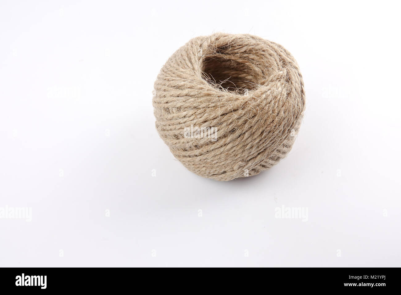 Various colour of ropes isolated on white background Stock Photo - Alamy