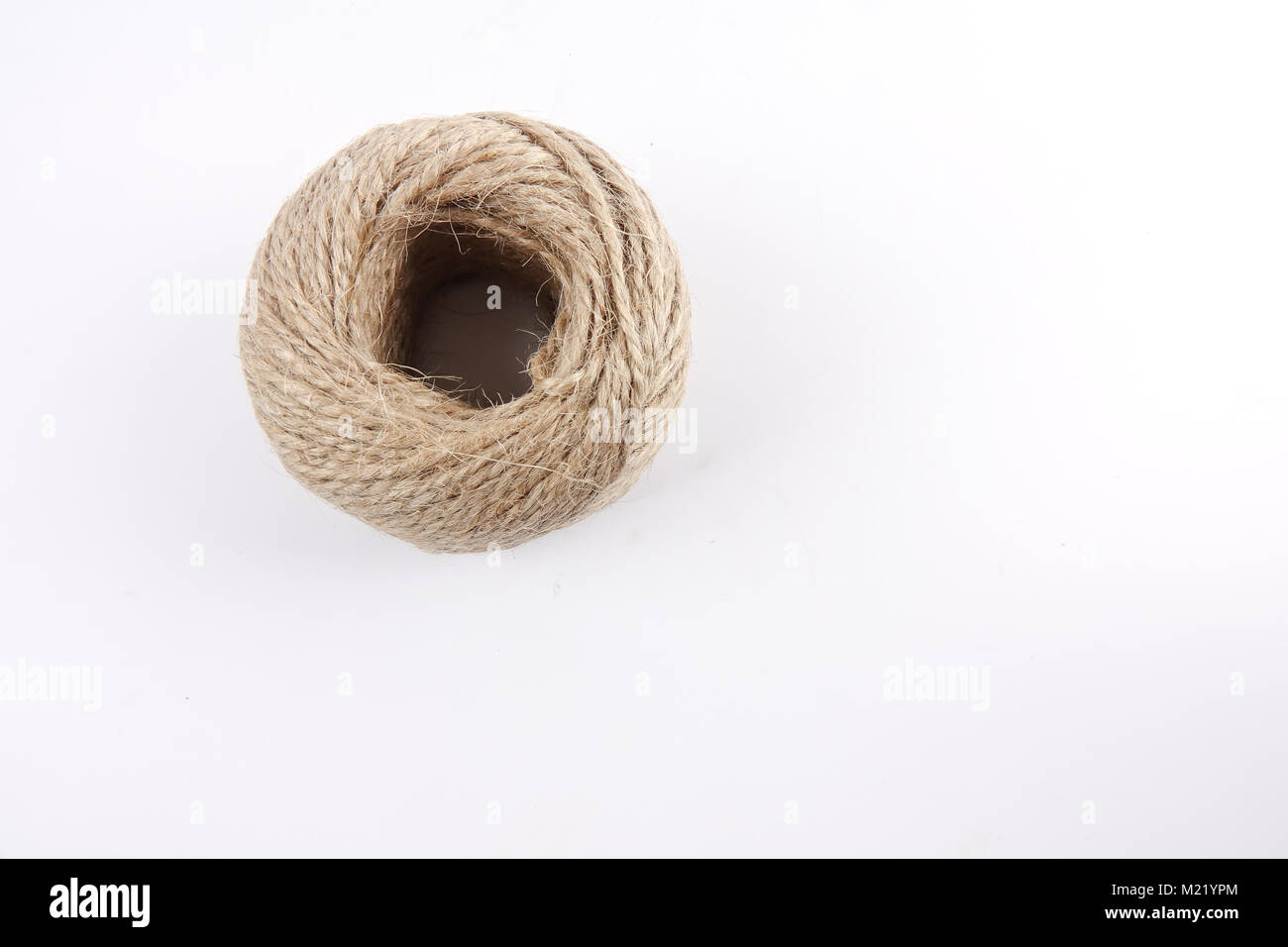 Various colour of ropes isolated on white background Stock Photo - Alamy