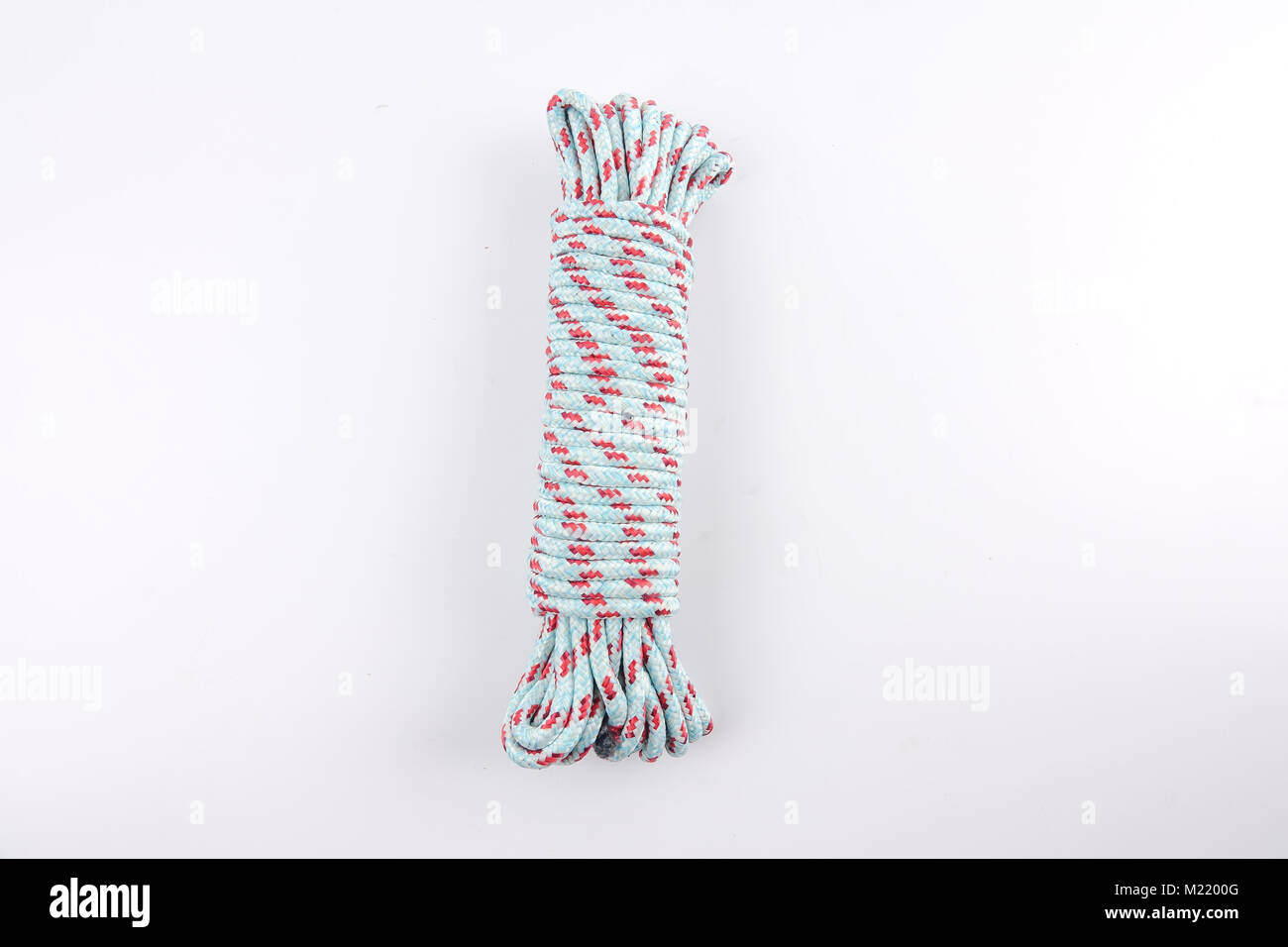 Various colour of ropes isolated on white background Stock Photo - Alamy