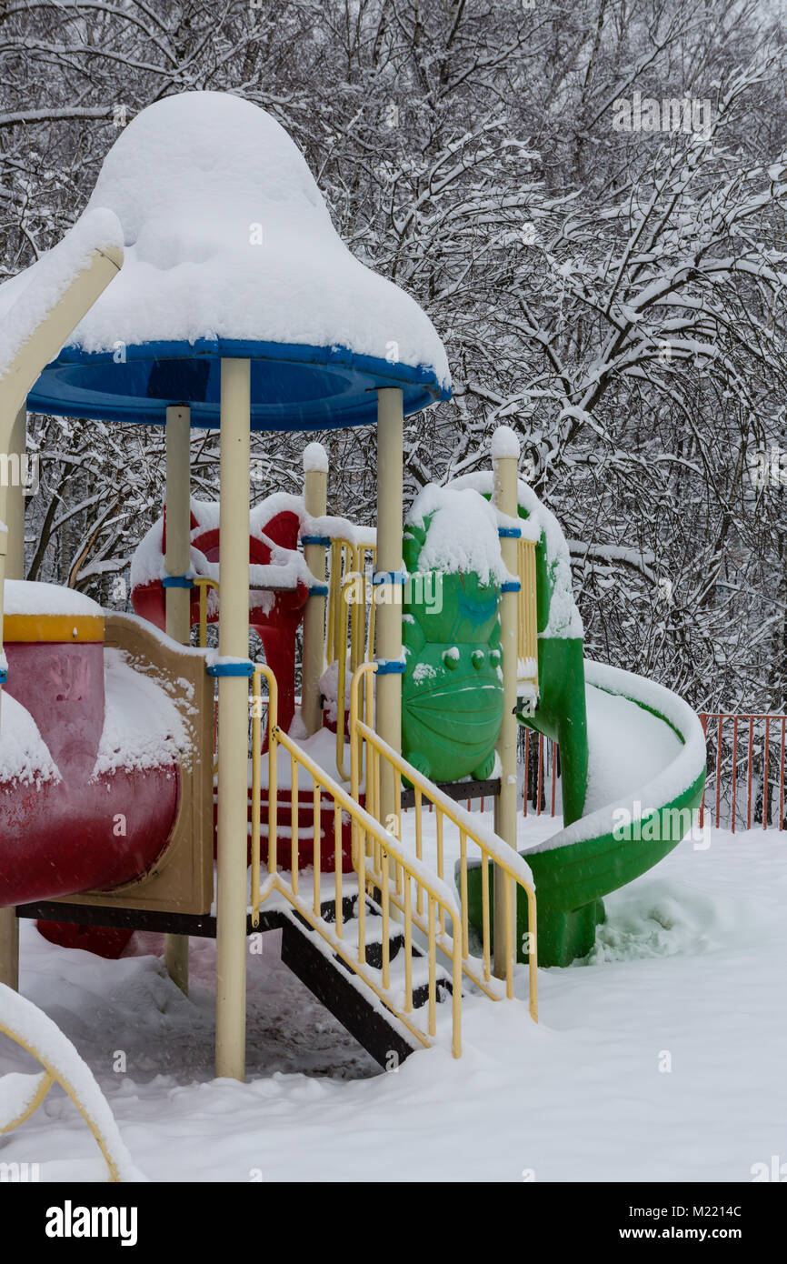 Playground covered with snow after a heavy snowfall Stock Photo - Alamy
