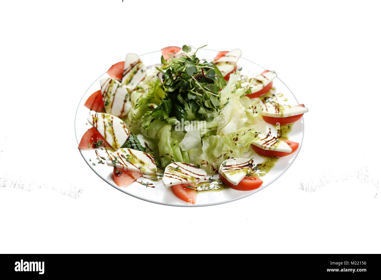 Vegetable salad isolated on white background Stock Photo - Alamy