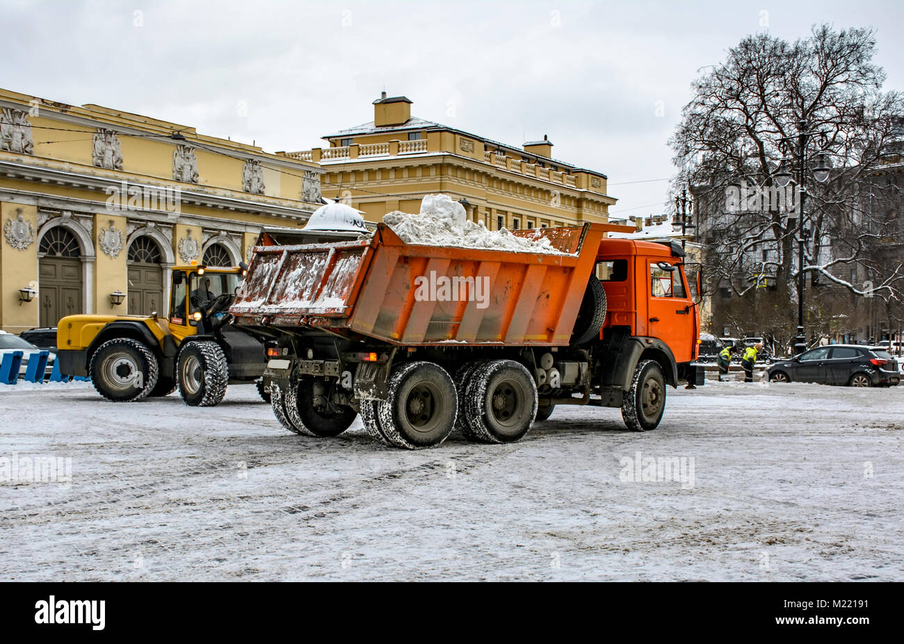 Snow removal on the town square in Saint-Petersburg. Snow removal ...