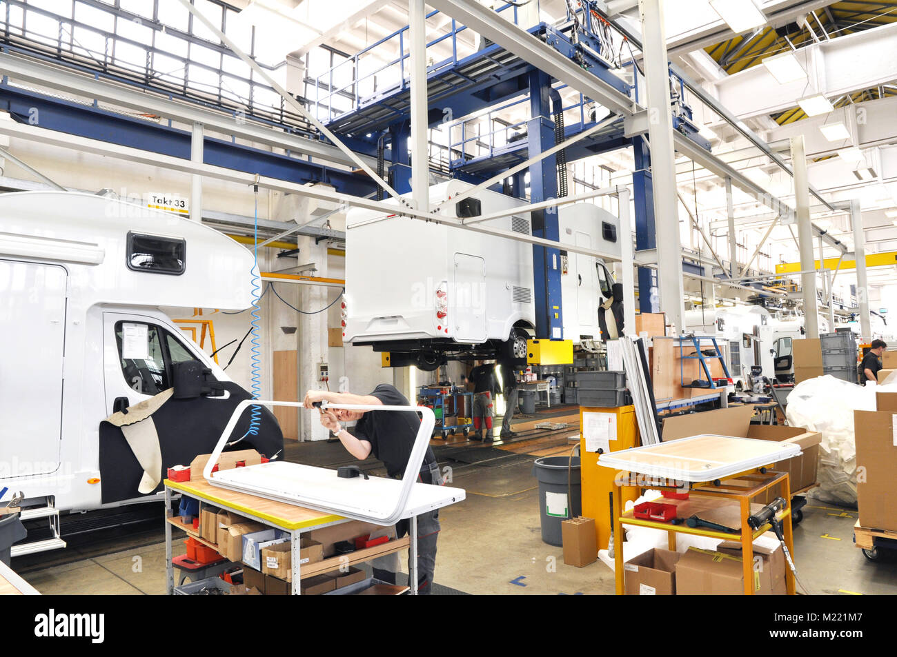 production of camper vans/ motorhomes/ caravans in a factory Stock ...