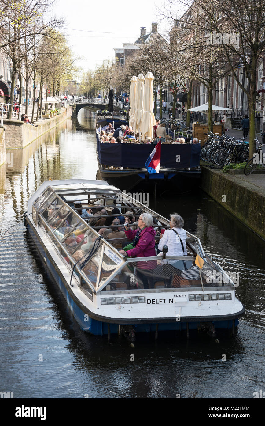 One of the tourist-carrying pleasure boats slowly making its way along ...