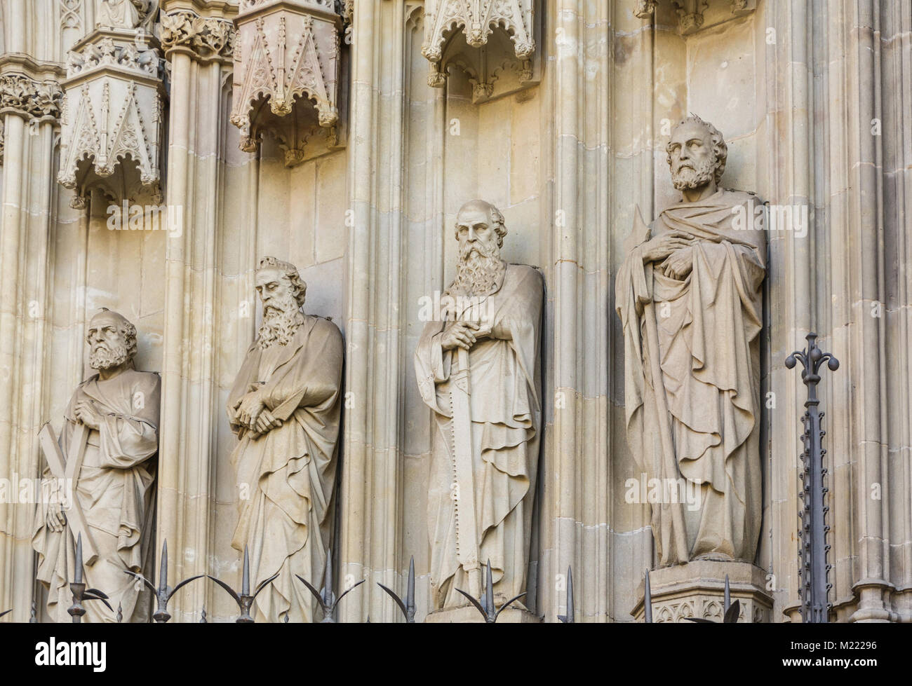 Four Old Statues on Ancient Barcelona Church Stock Photo - Alamy