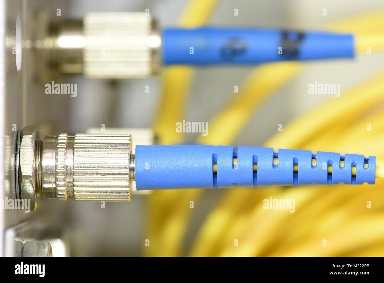 Optic fiber cables on distribution panel in data center Stock Photo - Alamy