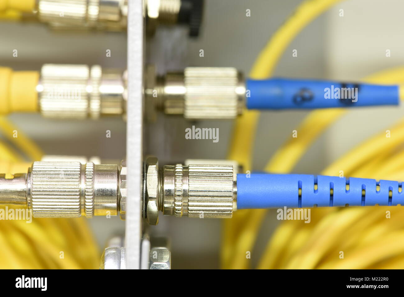 Optic fiber cables on distribution panel in data center Stock Photo - Alamy