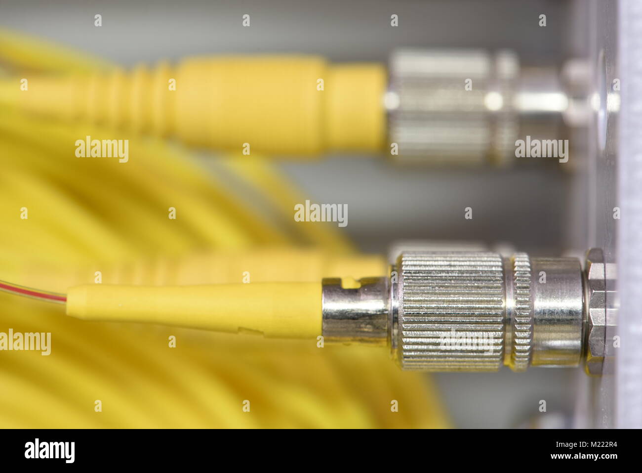 Optic fiber cables on distribution panel in data center Stock Photo - Alamy