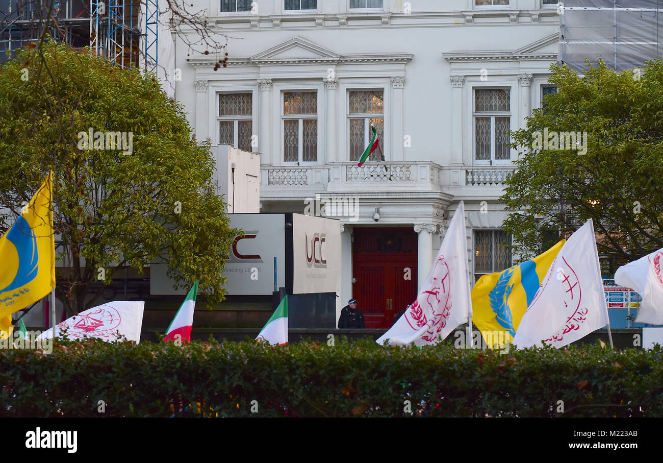 Protesters with Iranian flags gather outside the Consulate of the ...