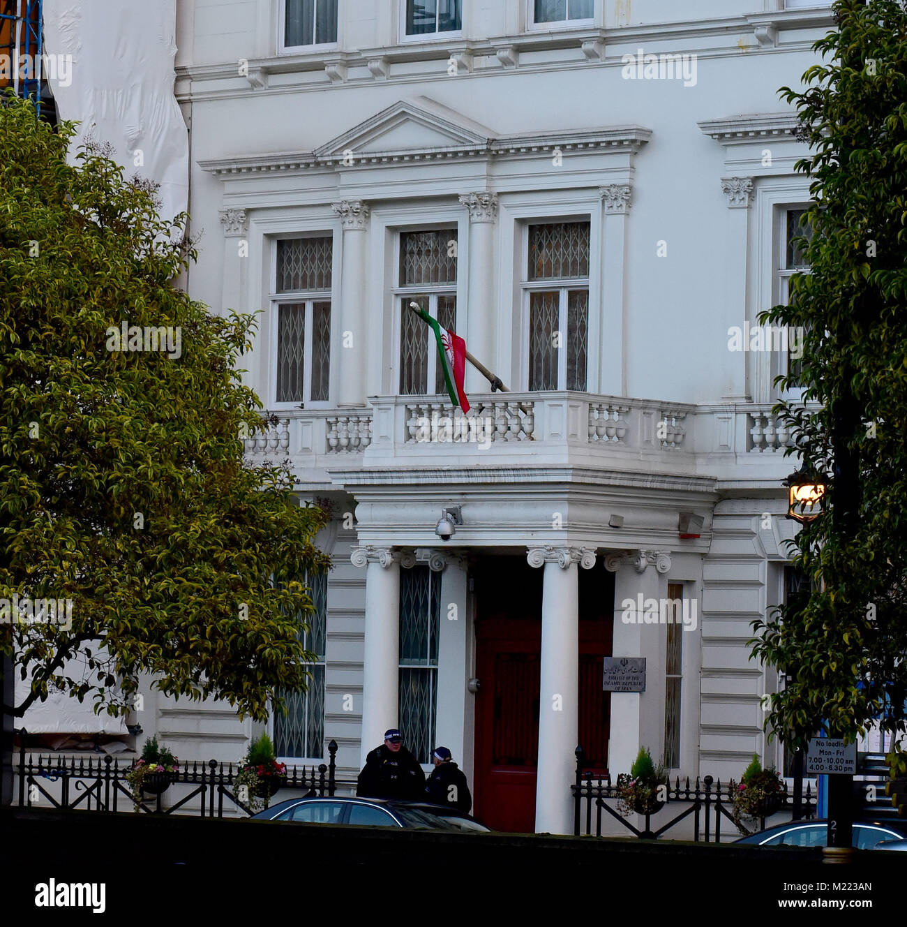 Protesters with Iranian flags gather outside the Consulate of the ...