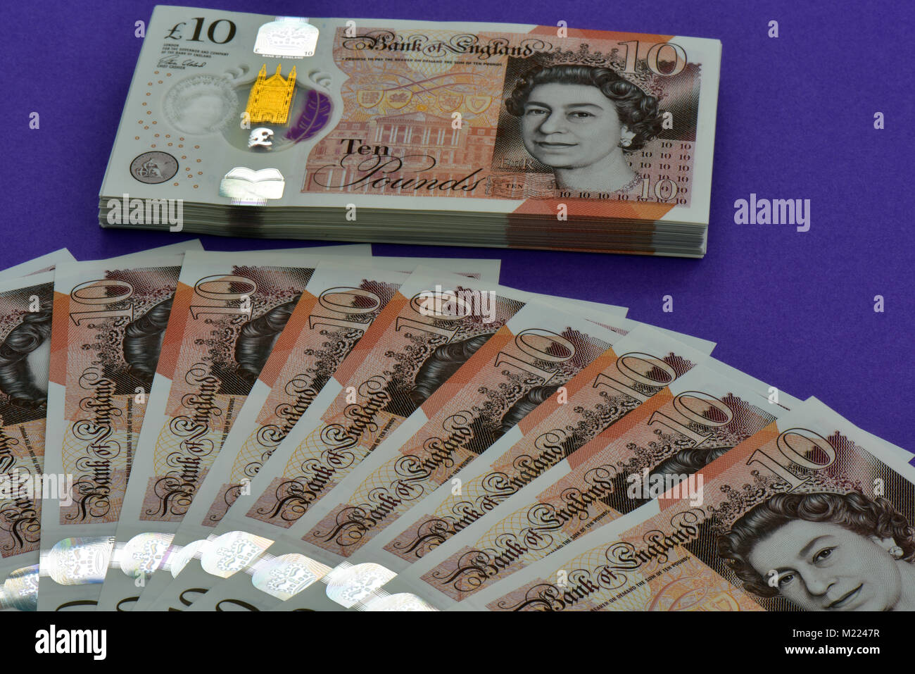 Pile tenners hi-res stock photography and images - Alamy