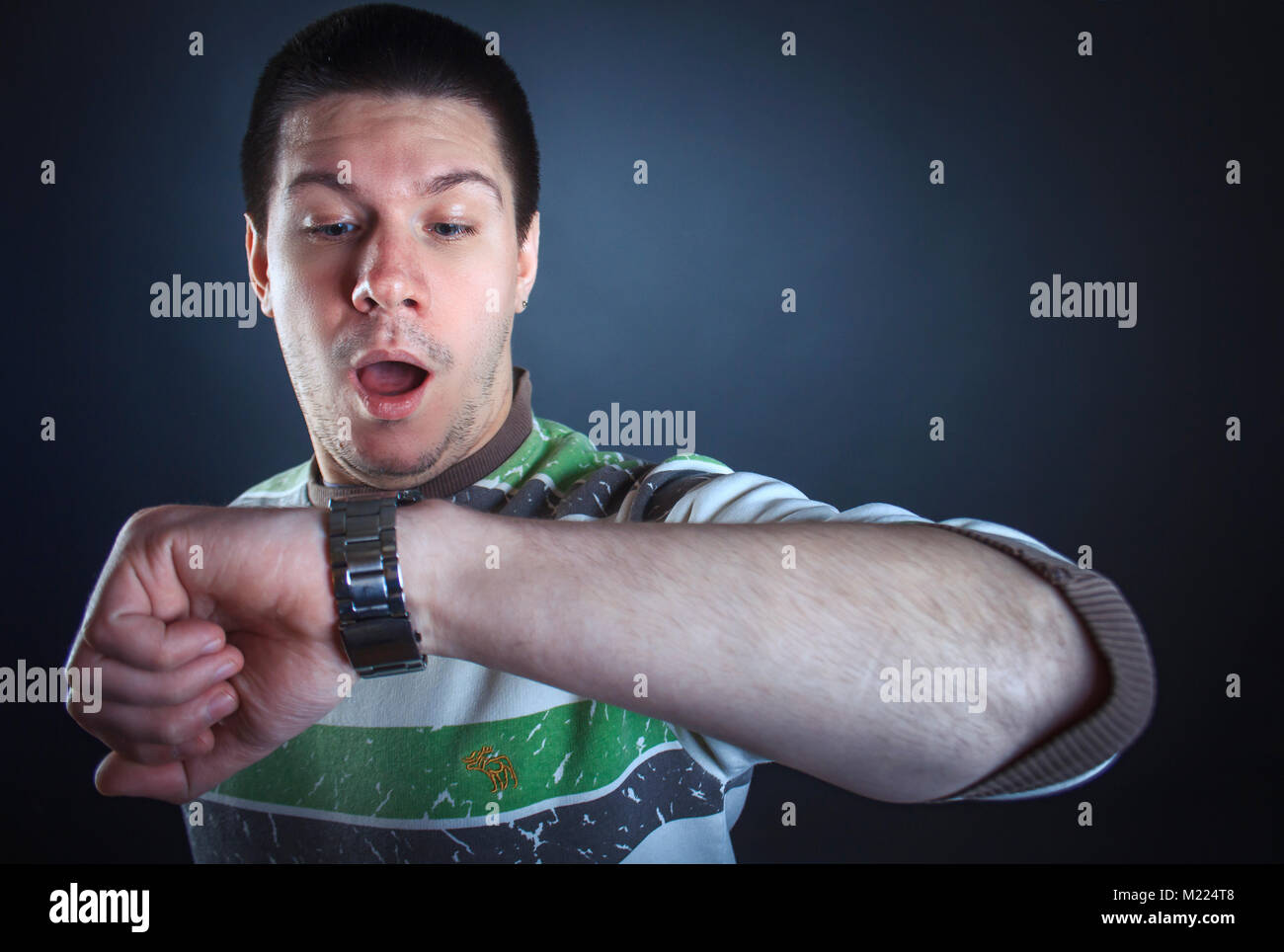 Bad time management, man screaming at his watch Stock Photo - Alamy