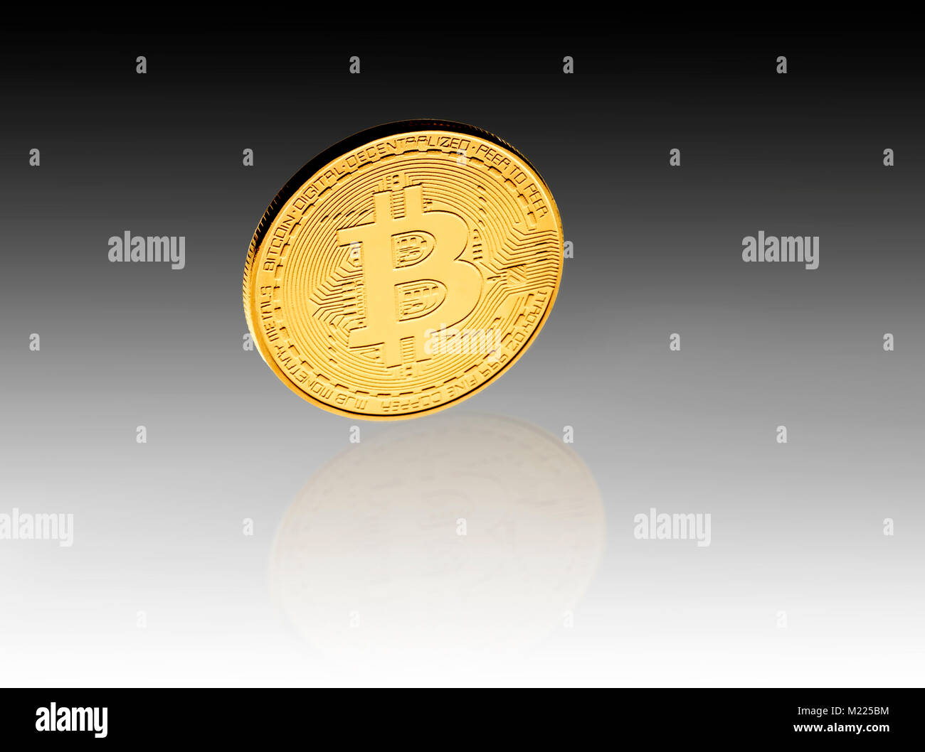 Gold coin of Bitcoin on gradient background closeup with reflection ...