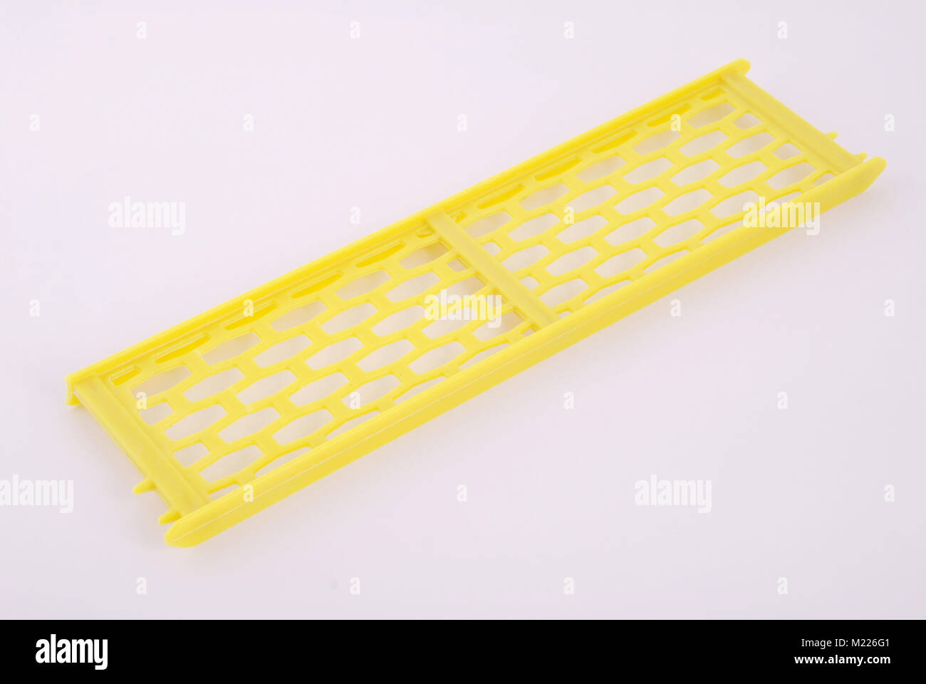 One yellow hair extender stops isolated on gray background Stock Photo ...