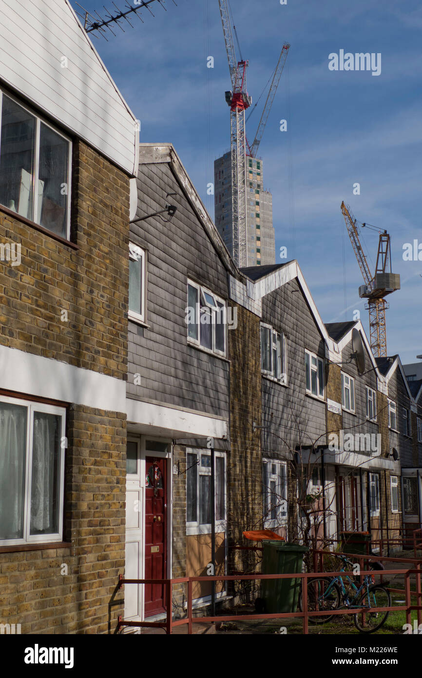 Social housing council homes with new private development being built ...