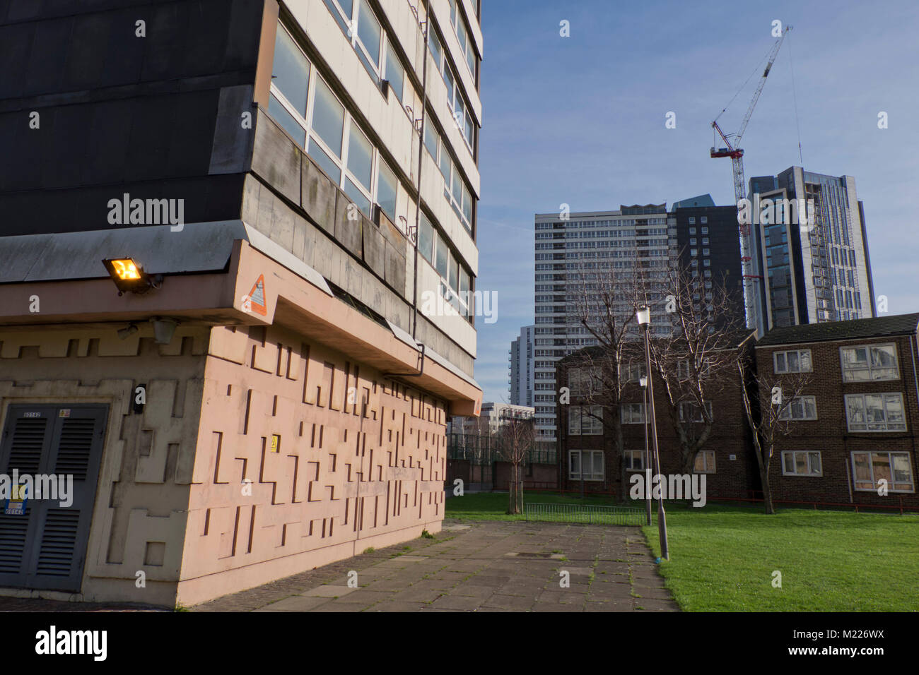 Social housing council homes with new private development being built ...