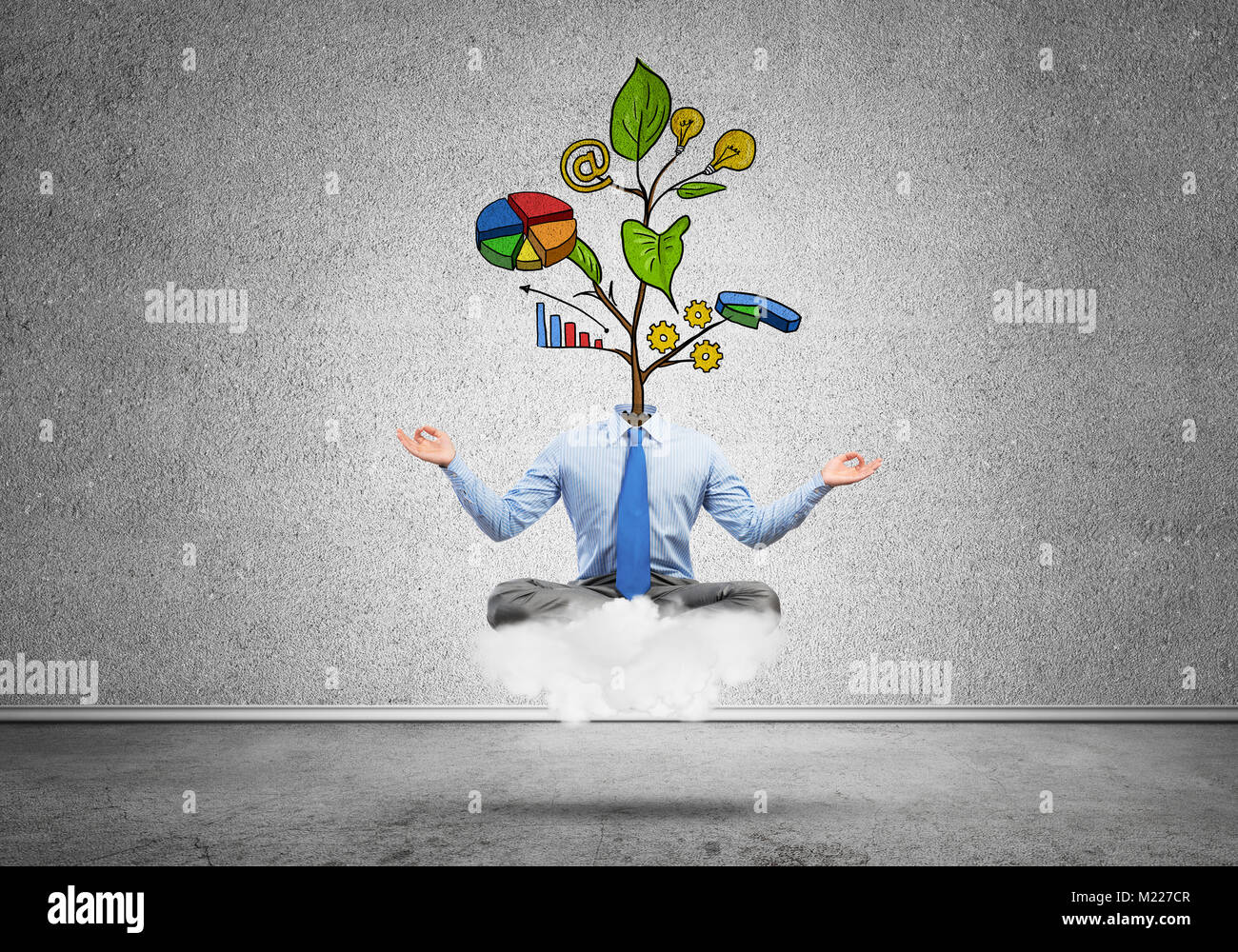 Headless businessman meditating Stock Photo - Alamy