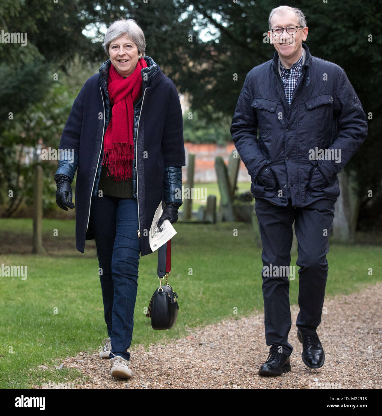 Prime Minister Theresa May and her husband Philip leave after attending ...