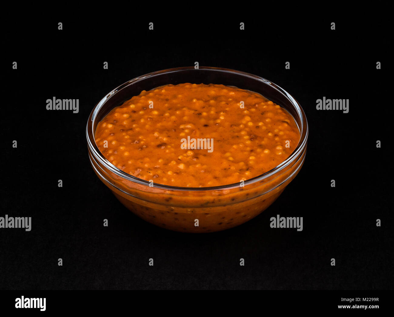 Sweet Bavarian mustard on black background Stock Photo - Alamy