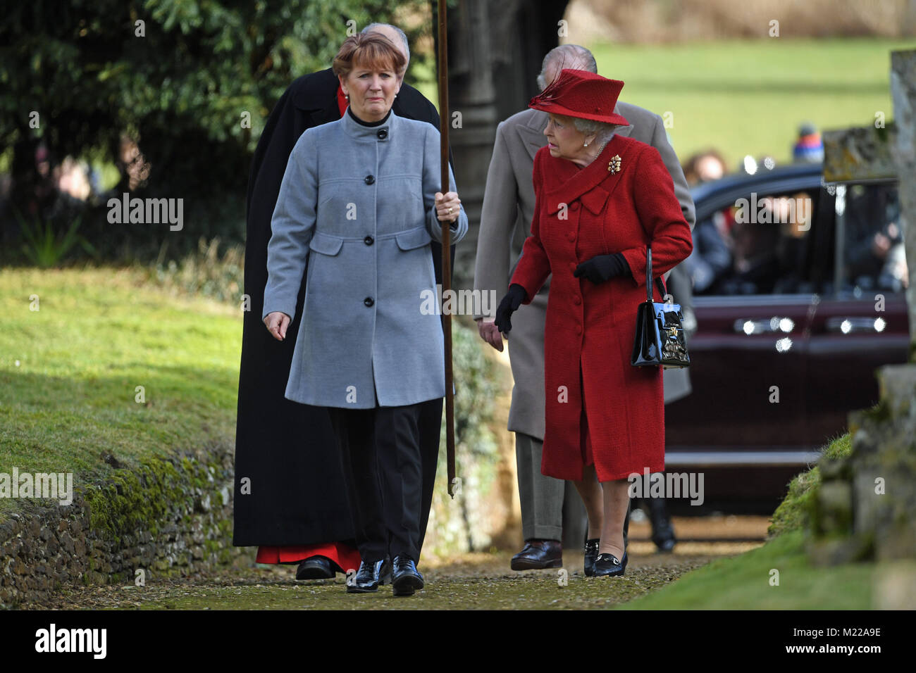 Queen Elizabeth II and the Duke of Edinburgh (rear right) attending St ...