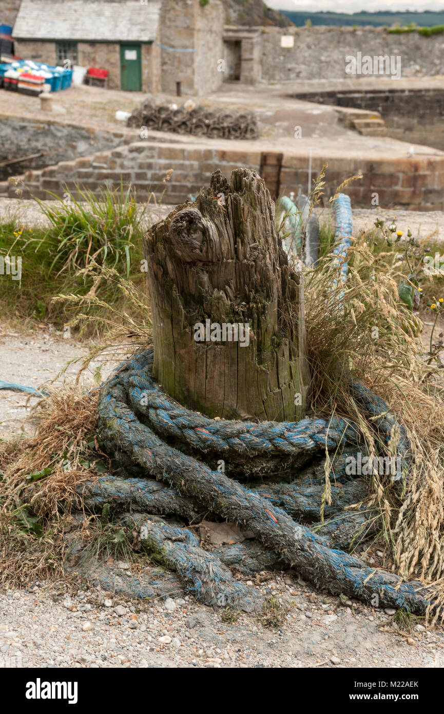 Old rotten wooden bollard and Mooring Rope at Charlestown Harbour ...