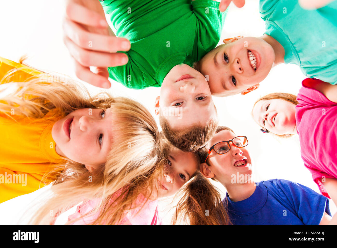 Kids faces in a round Stock Photo - Alamy