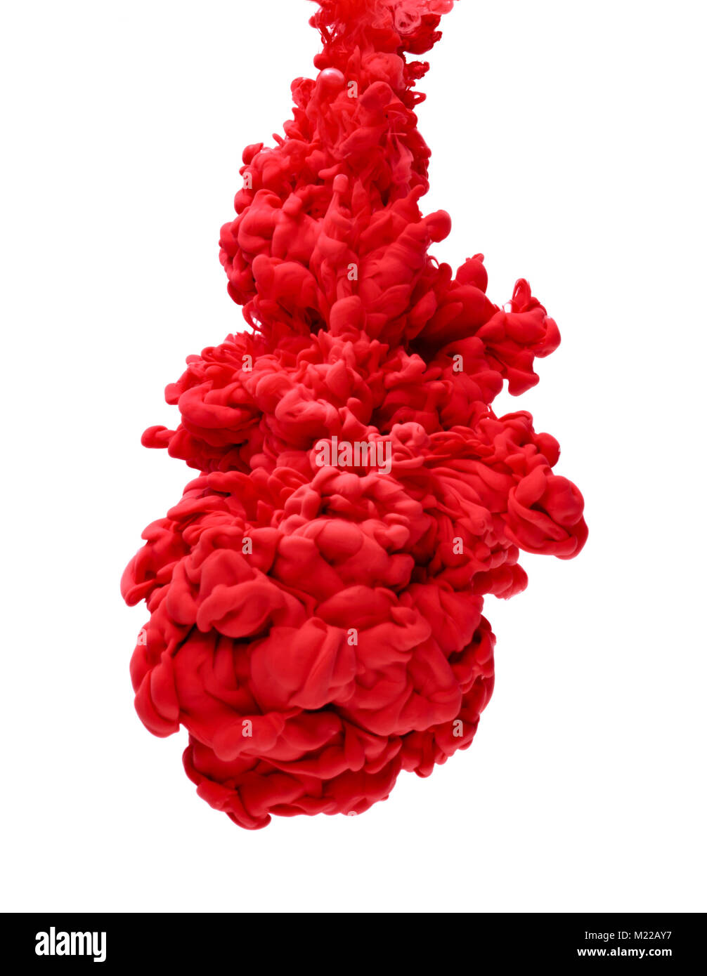 red color paint pouring in water Stock Photo - Alamy