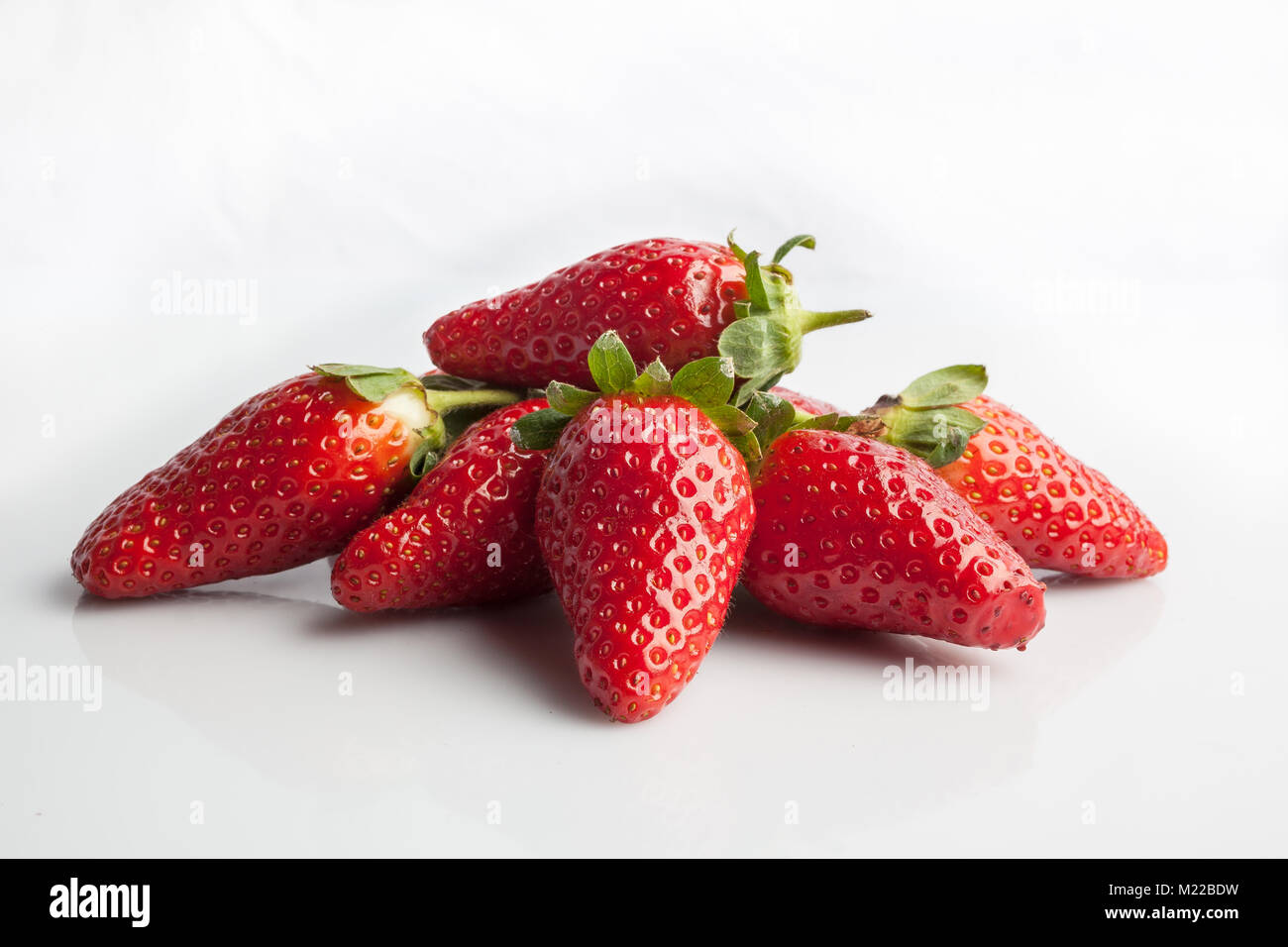 Bunch of ripe strawberries on white background view from above Stock ...
