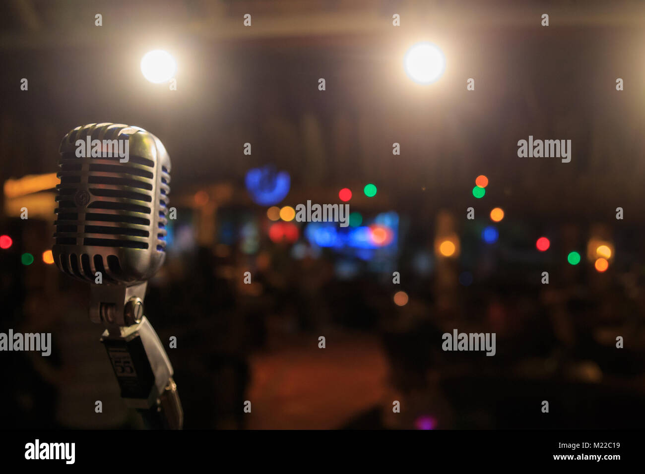 Retro microphone on stage in a pub Stock Photo - Alamy