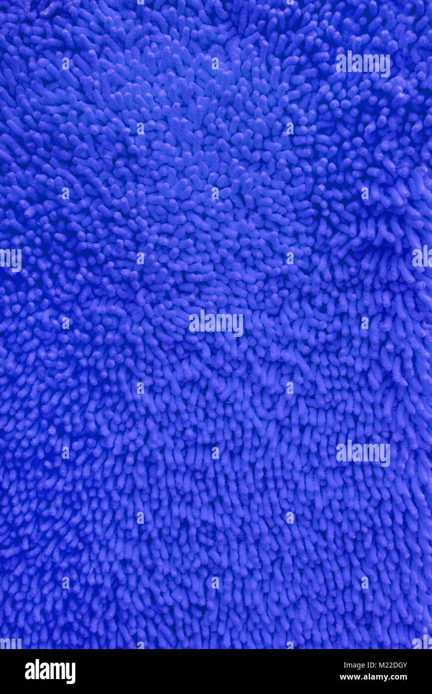 blue fluffy bathroom mat Stock Photo - Alamy