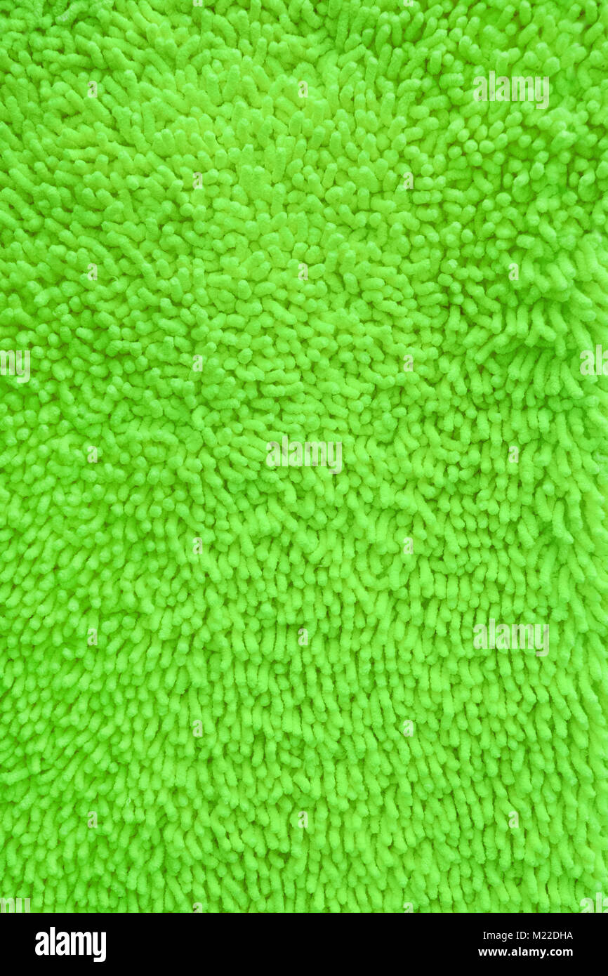 green fluffy bathroom mat Stock Photo - Alamy