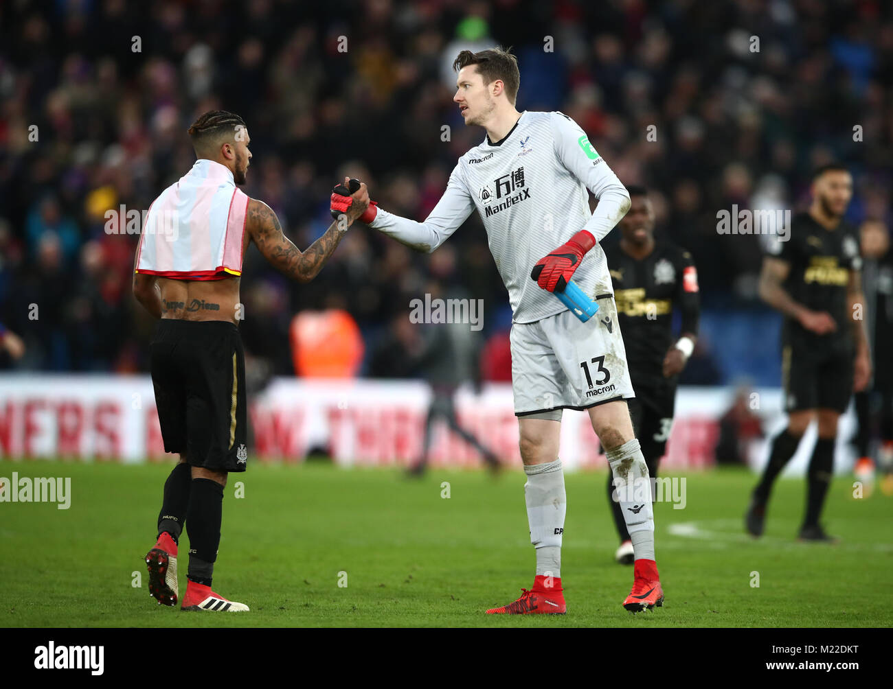 Newcastle United's DeAndre Yedlin (left) and Crystal Palace goalkeeper ...