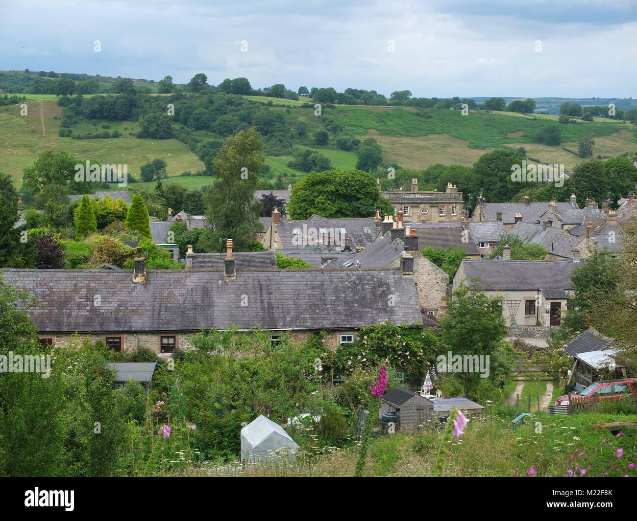 The Peak District village of Winster viewed from 'The Flat'. Gardens ...