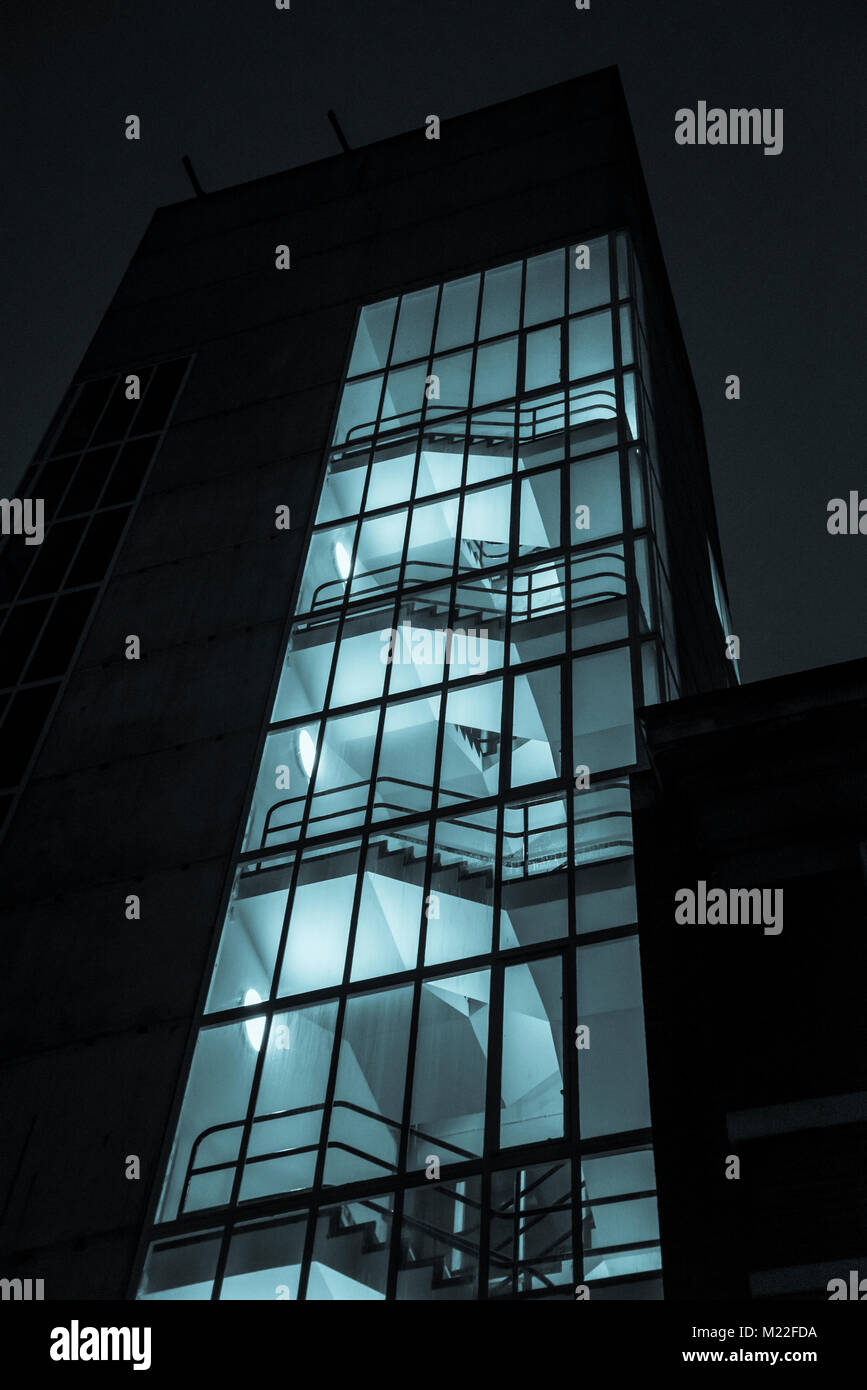 Empty tower with staircase lit at night, London, England, UK Stock ...