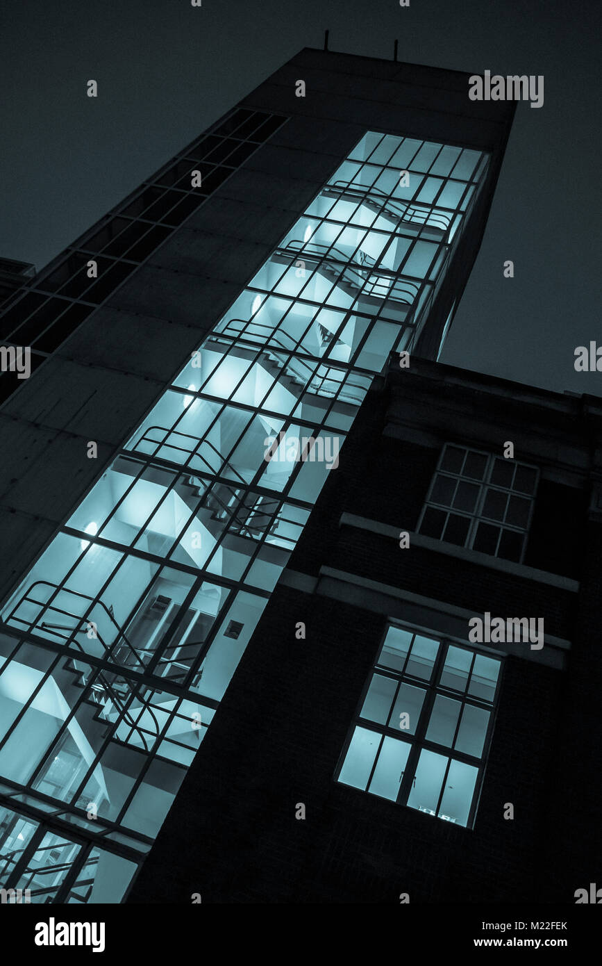 Empty tower with staircase lit at night, London, England, UK Stock ...